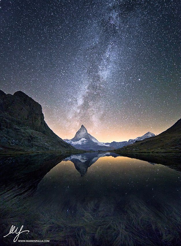 Via Láctea no lago Riffelsee, nos Alpes Suíços